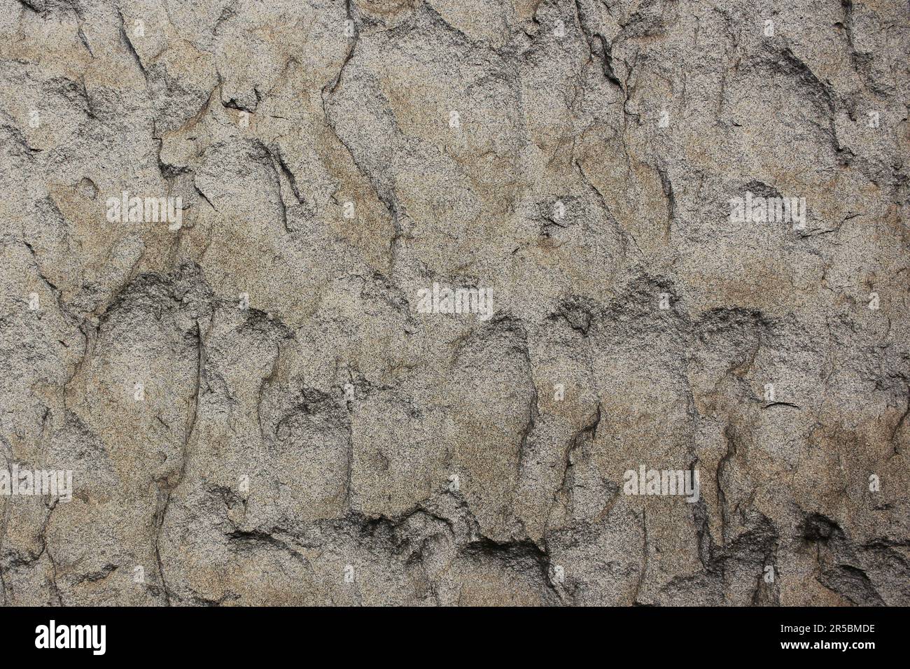 A worn and weathered natural stone wall with lots of texture Stock ...