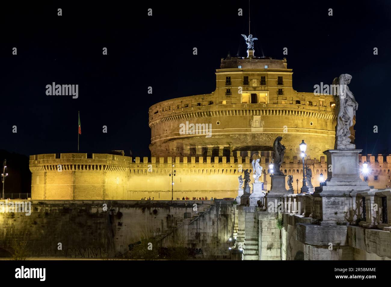 The Saint Angelo Castle in Rome illuminated at night Stock Photo - Alamy