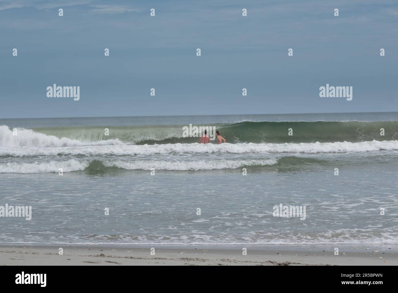 People swimming in the beautiful blue ocean of Myrtle Beach, South ...