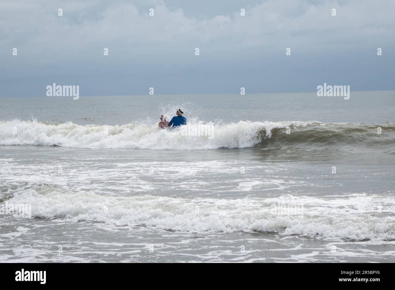 People swimming in the beautiful blue ocean of Myrtle Beach, South ...