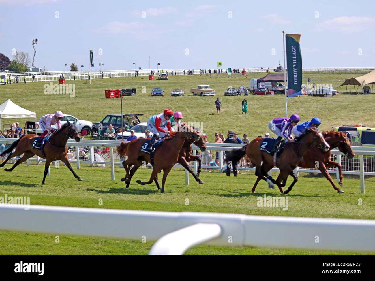 Epsom Downs Surrey, UK. 2nd June, 2023. The runners and riders come ...