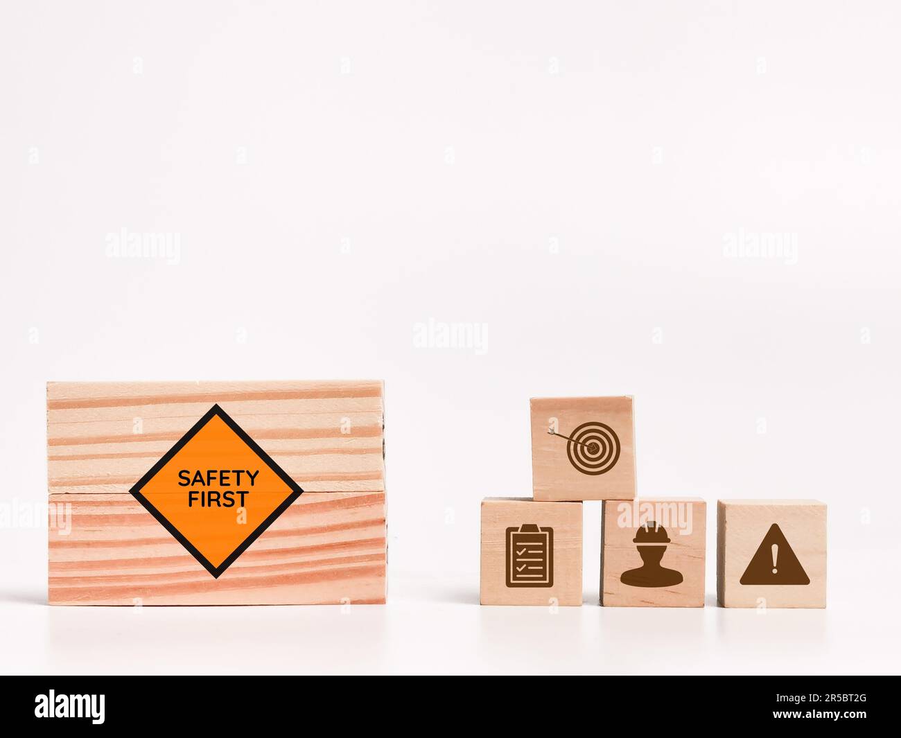 An accident prevention concept on wooden blocks with safety-related ...