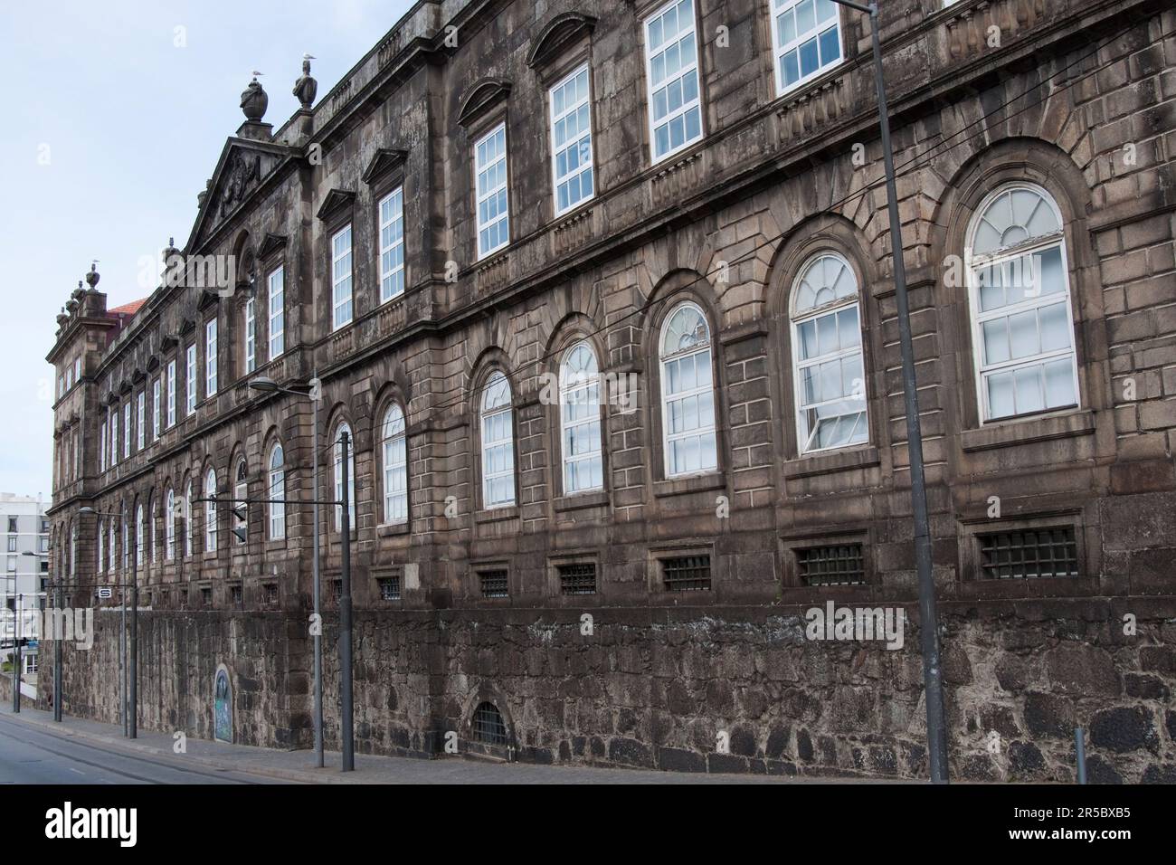 An idyllic urban street featuring vintage brick buildings with street ...