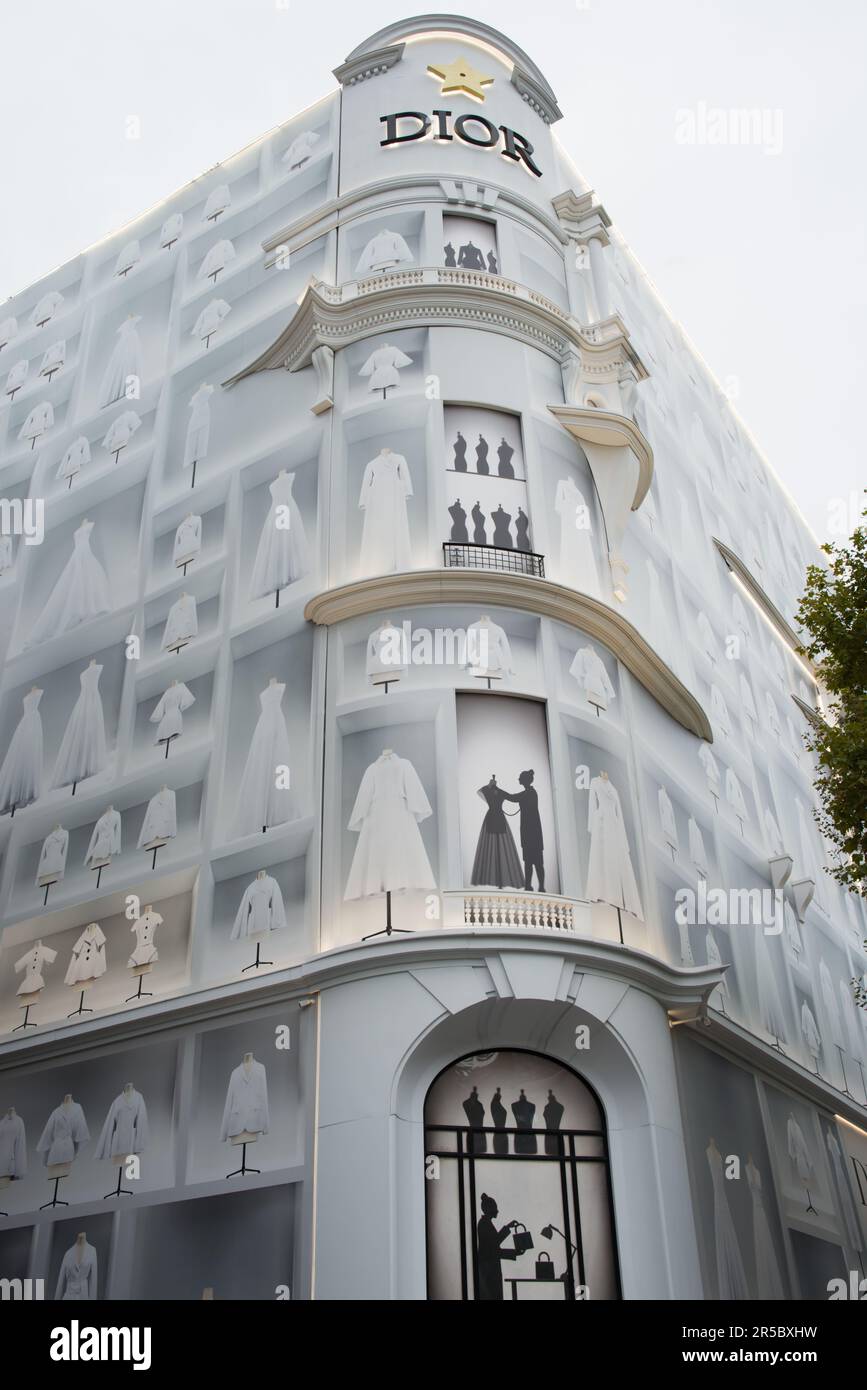 The large white building of DIOR in France with fashionable clothing ...