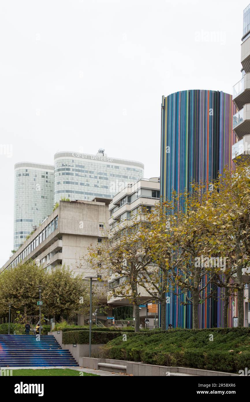 A large building adorned with vibrant, multicolored painted lines in ...