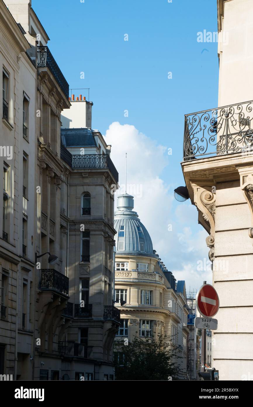 A vibrant street scene in Paris, France featuring a variety of ...