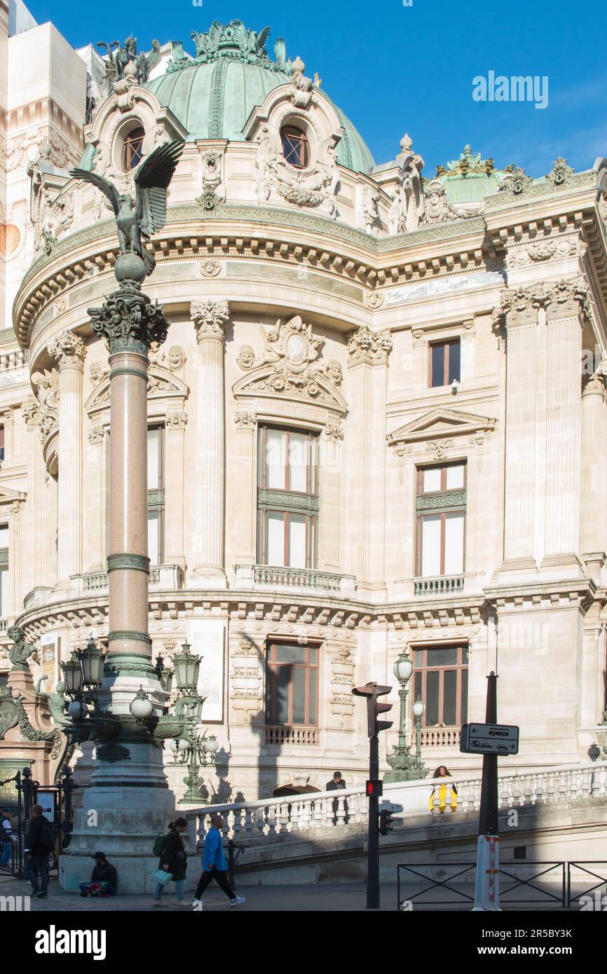 The Palais Garnier opera house in Paris, France with people nearby ...