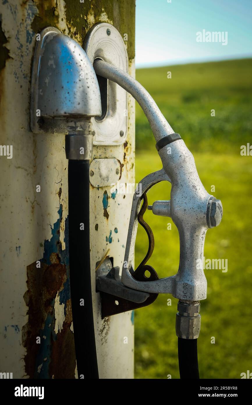 An old rustic gas pump against a blurry backdrop Stock Photo - Alamy