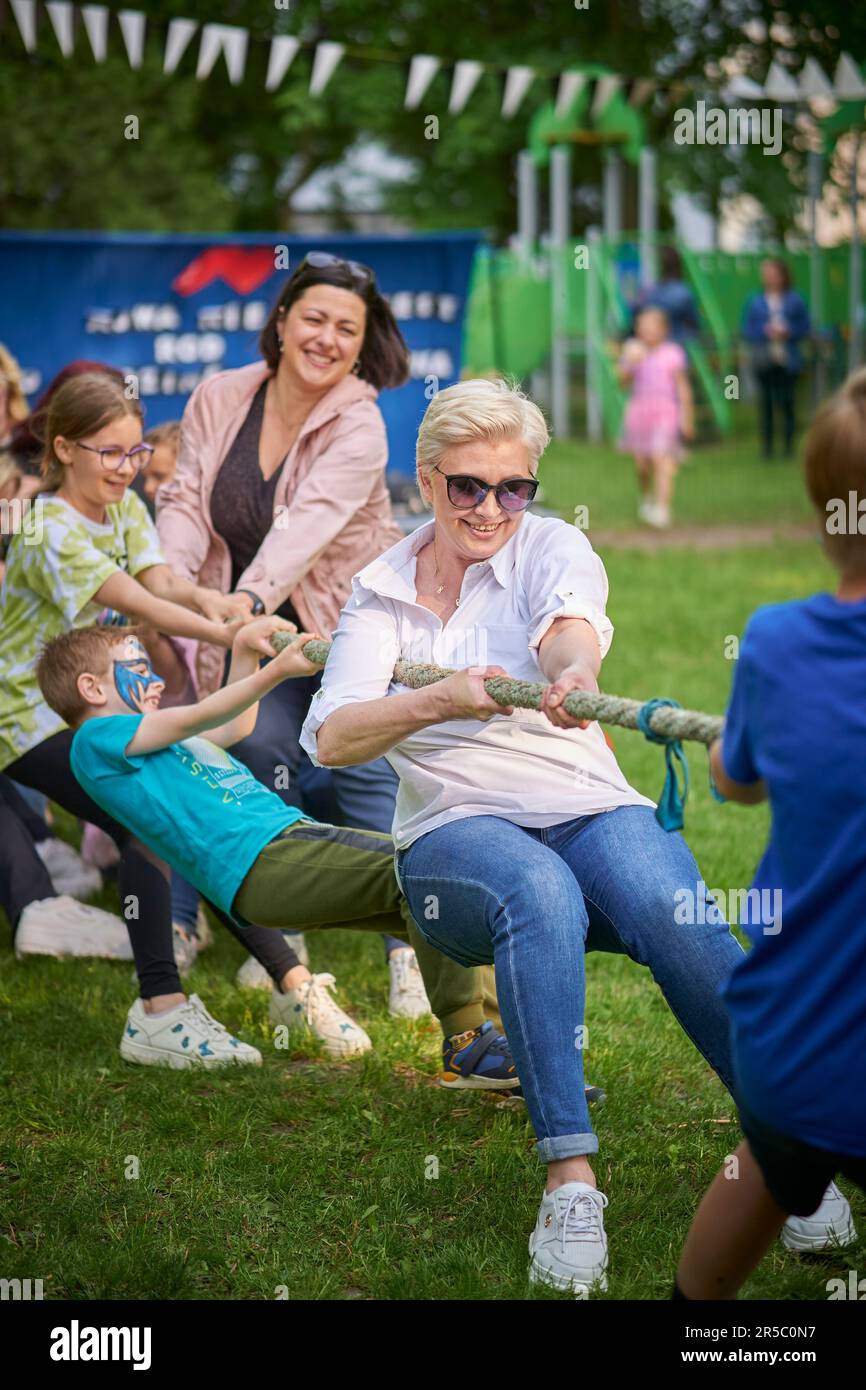 The people pulling the rope during an outdoor competition Stock Photo ...