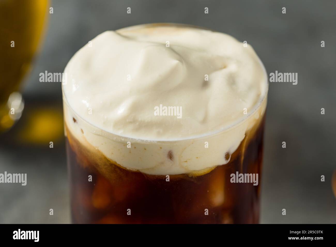 Cold Oleato Olive Oil Iced Coffee in a Cup Stock Photo - Alamy