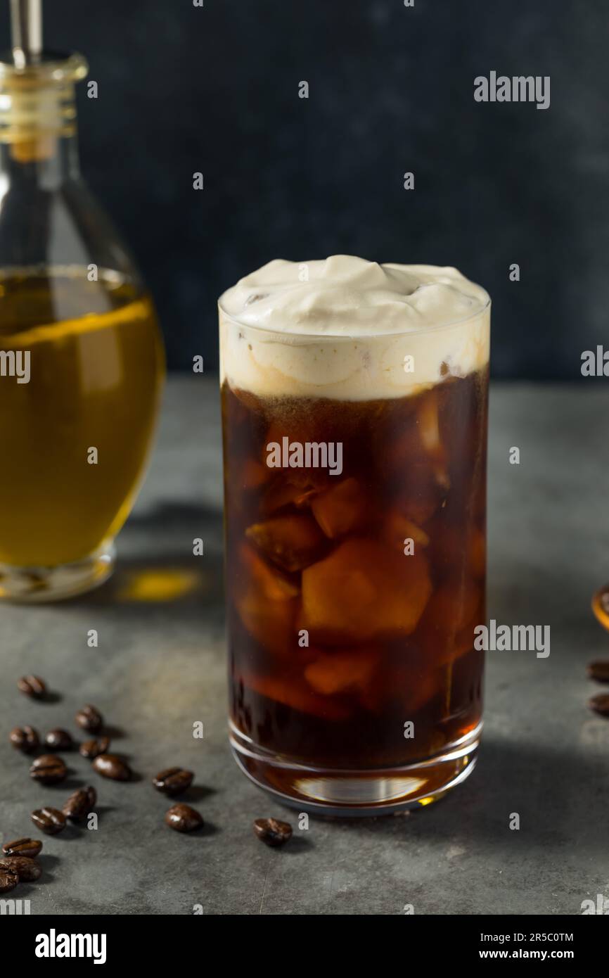 Cold Oleato Olive Oil Iced Coffee in a Cup Stock Photo - Alamy