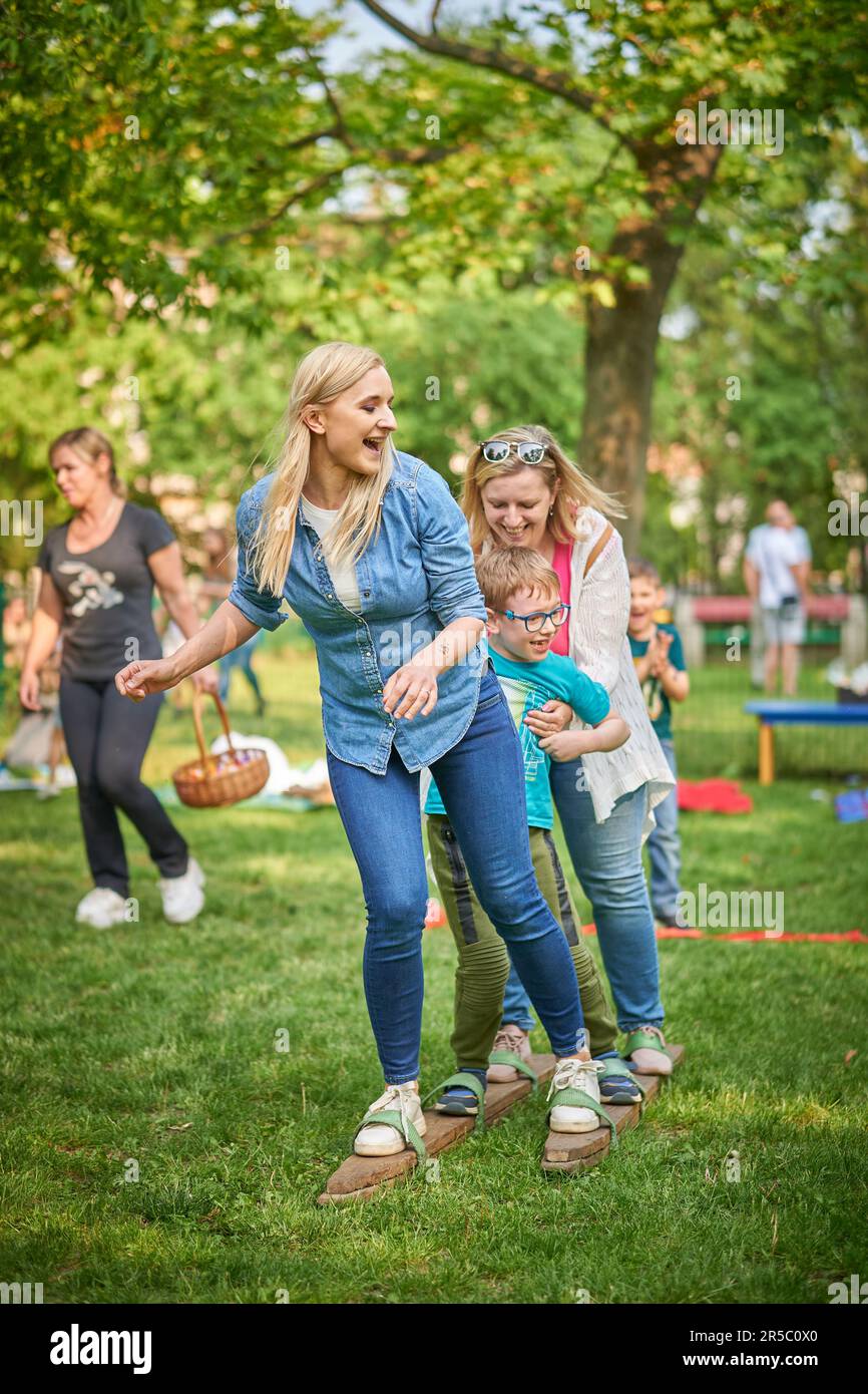 The people in the park playing team-building games Stock Photo - Alamy