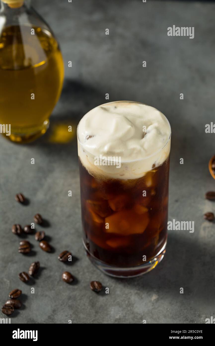Cold Oleato Olive Oil Iced Coffee in a Cup Stock Photo - Alamy