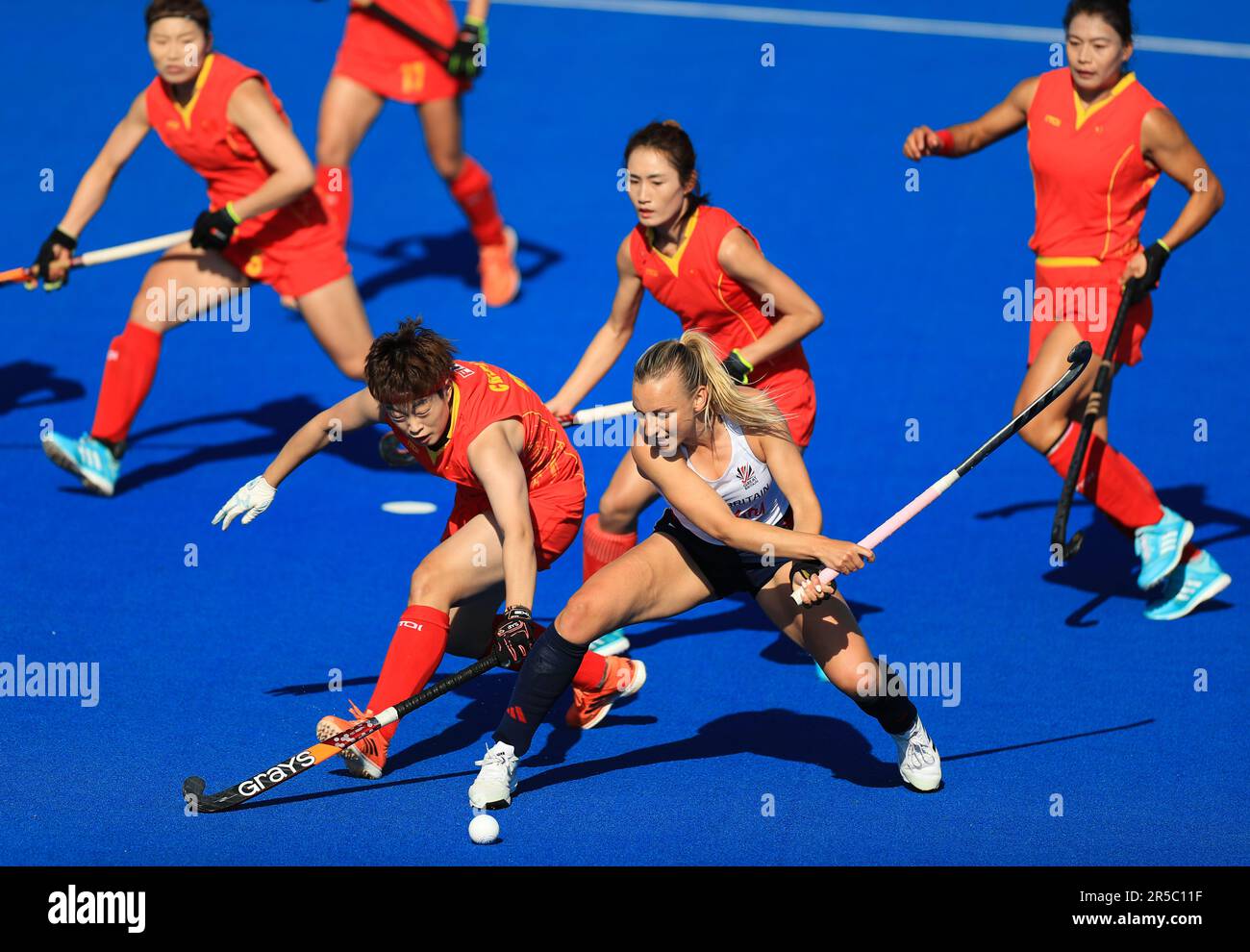Great Britain's Hannah Martin battles for the ball with China's Xindan ...