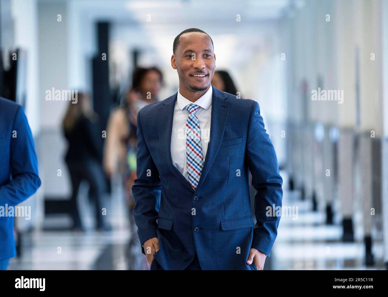 Former football player Travis Rudolph walks to a courtroom during a ...