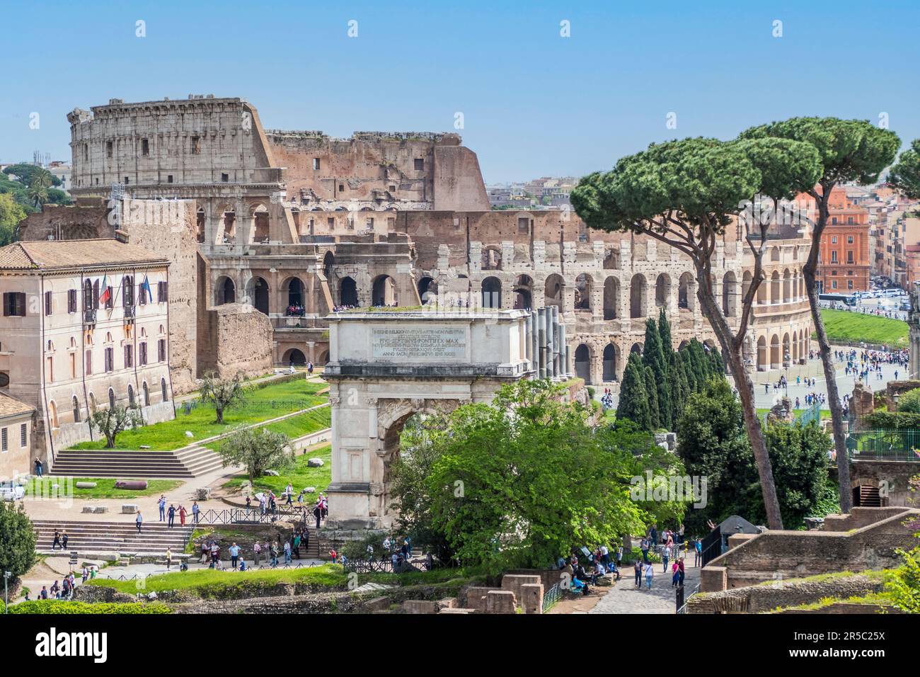 Aerial panoramic view of the ruins of the Roman Forum with Colosseum in ...