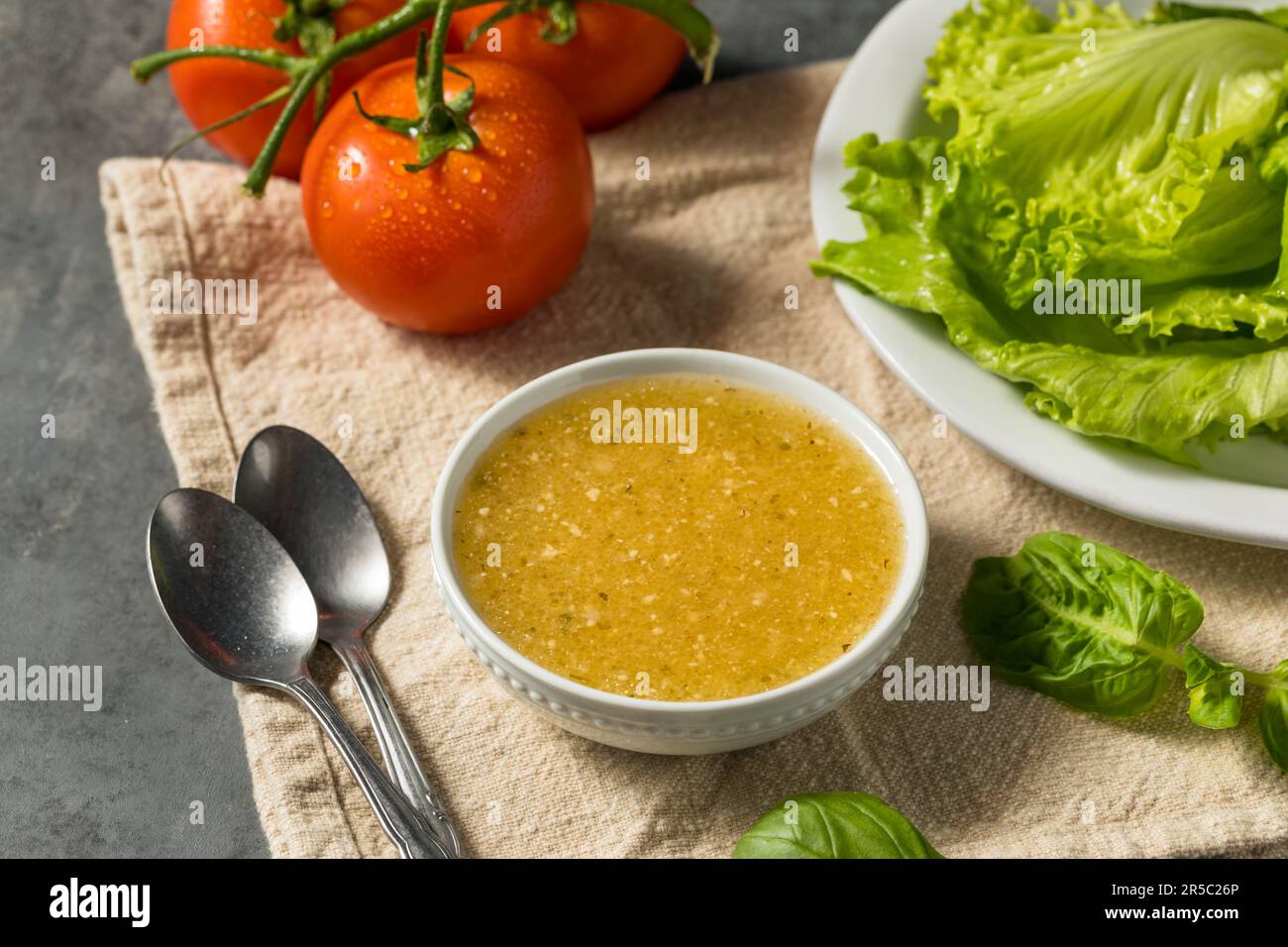Organic Homemade Italian Salad Dressing with Garlic and Oil Stock Photo ...