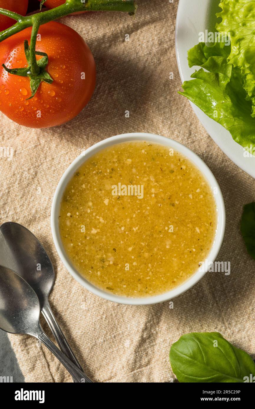 Organic Homemade Italian Salad Dressing with Garlic and Oil Stock Photo ...