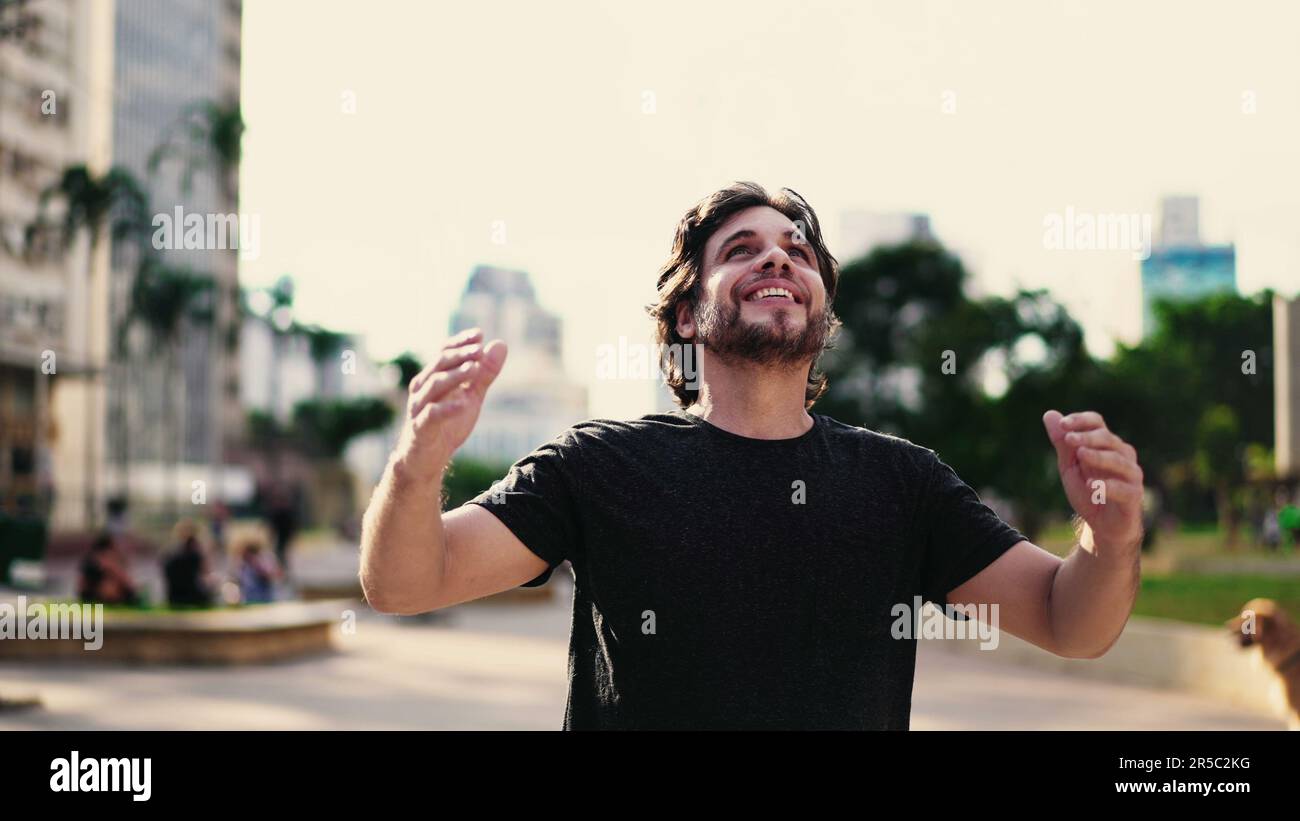 Contented young man embracing moment hi-res stock photography and ...