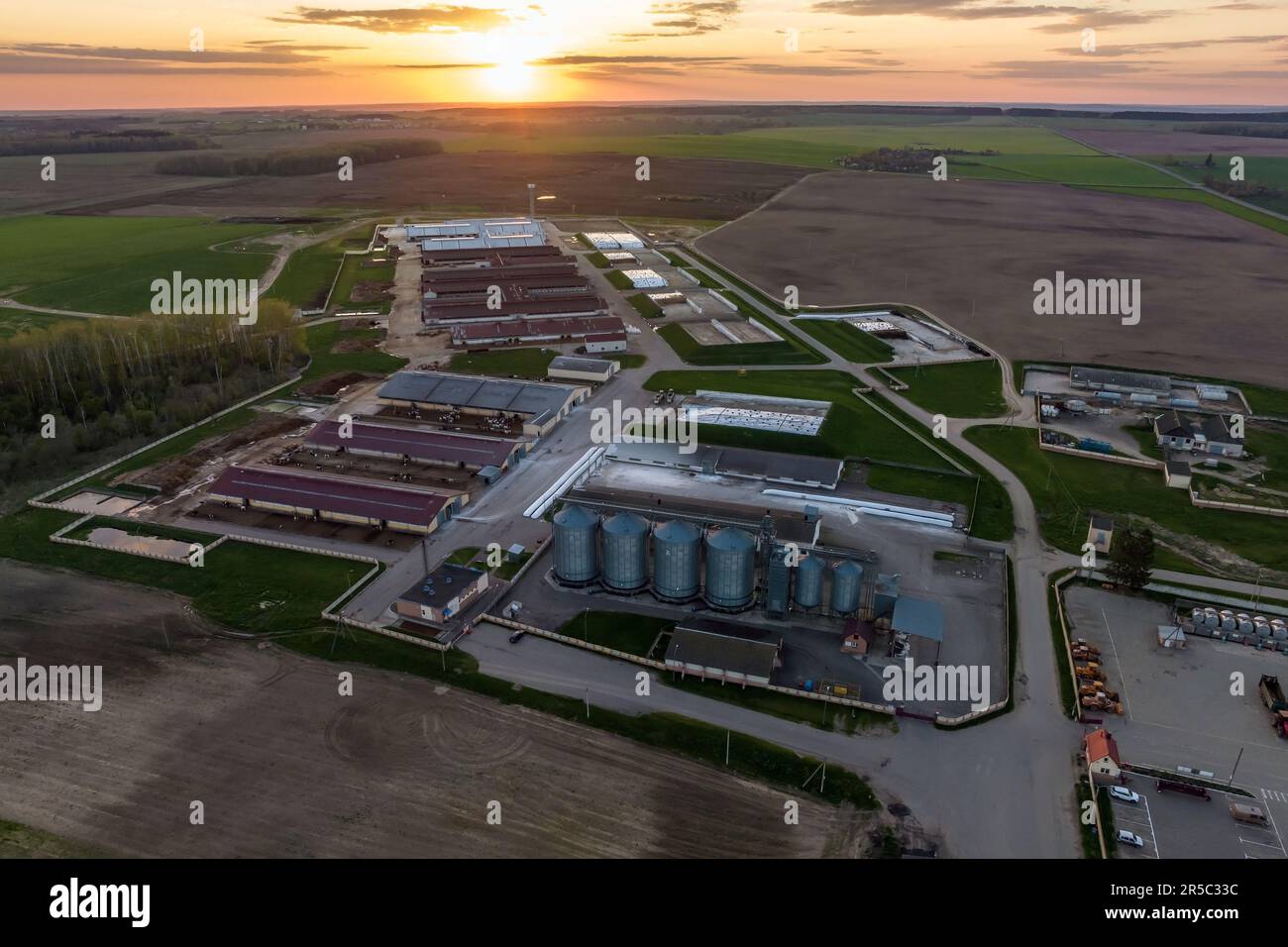 aerial panoramic view on agro-industrial complex with silos and grain ...