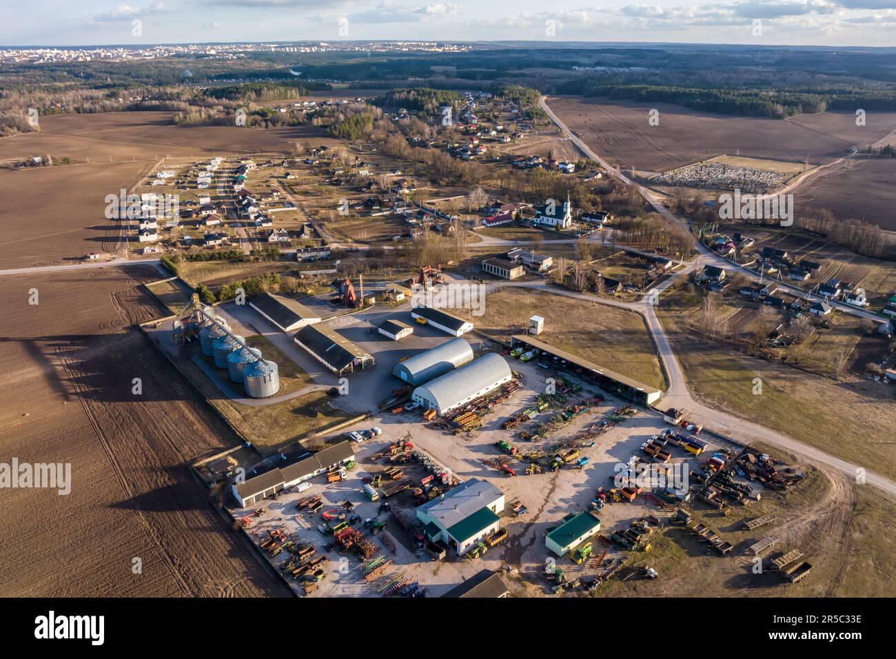 aerial panoramic view on agro-industrial complex with silos and grain ...