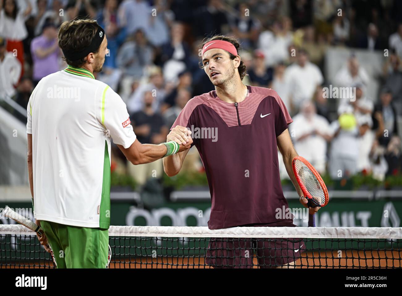 Taylor Fritz and Arthur Rinderknech during the French Open, Grand Slam ...