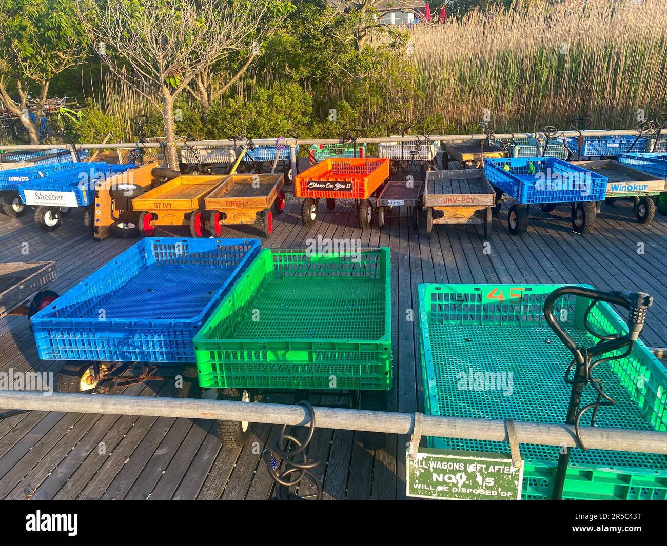 Ocean Bay Park, New York, USA - 29 May 2023: Many colorful pull wagons ...