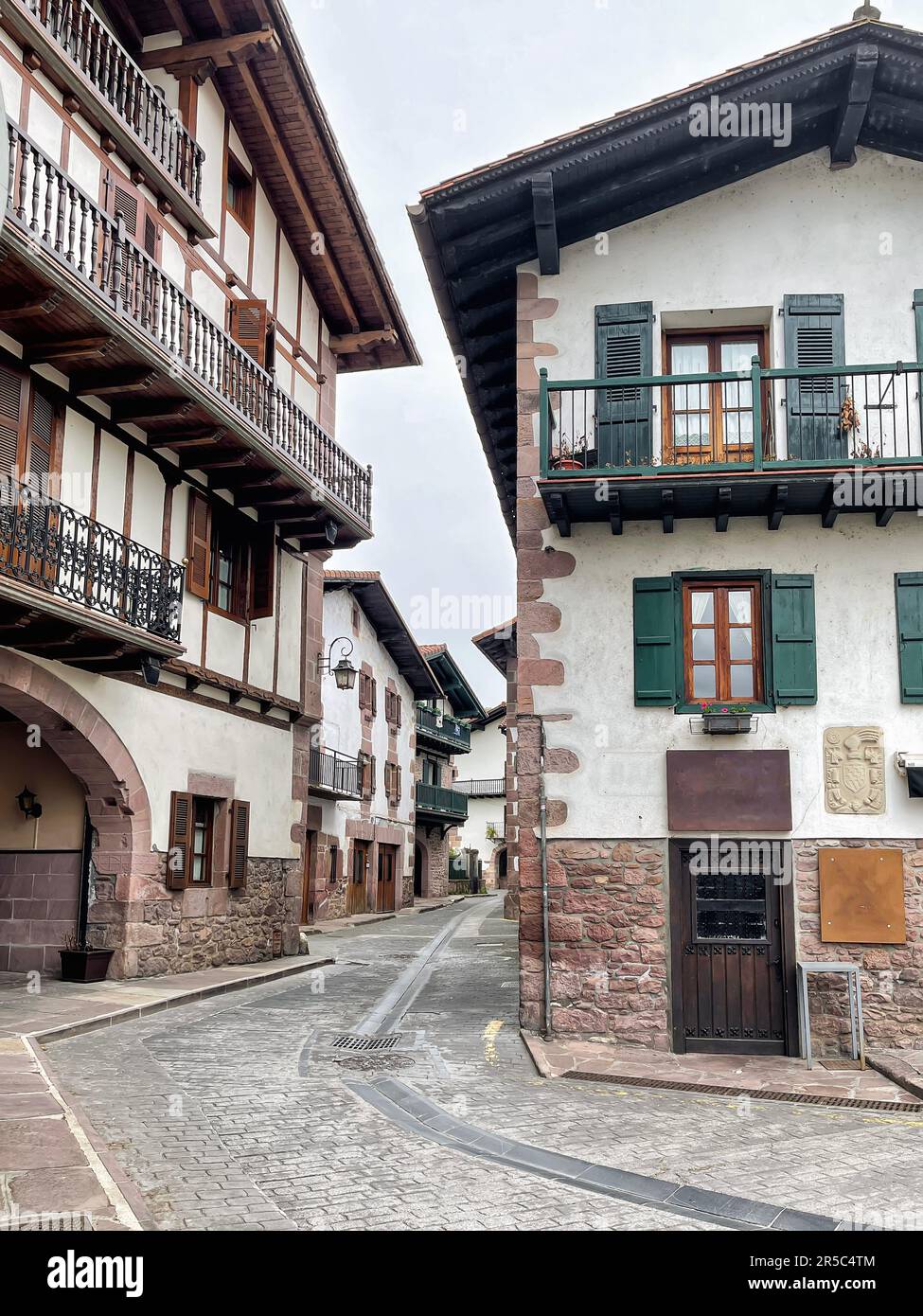 street of a village in the basque country, with typical basque houses ...