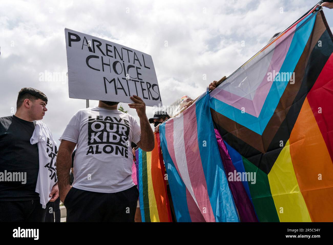 People protesting a planned Pride month assembly and counterprotesters ...