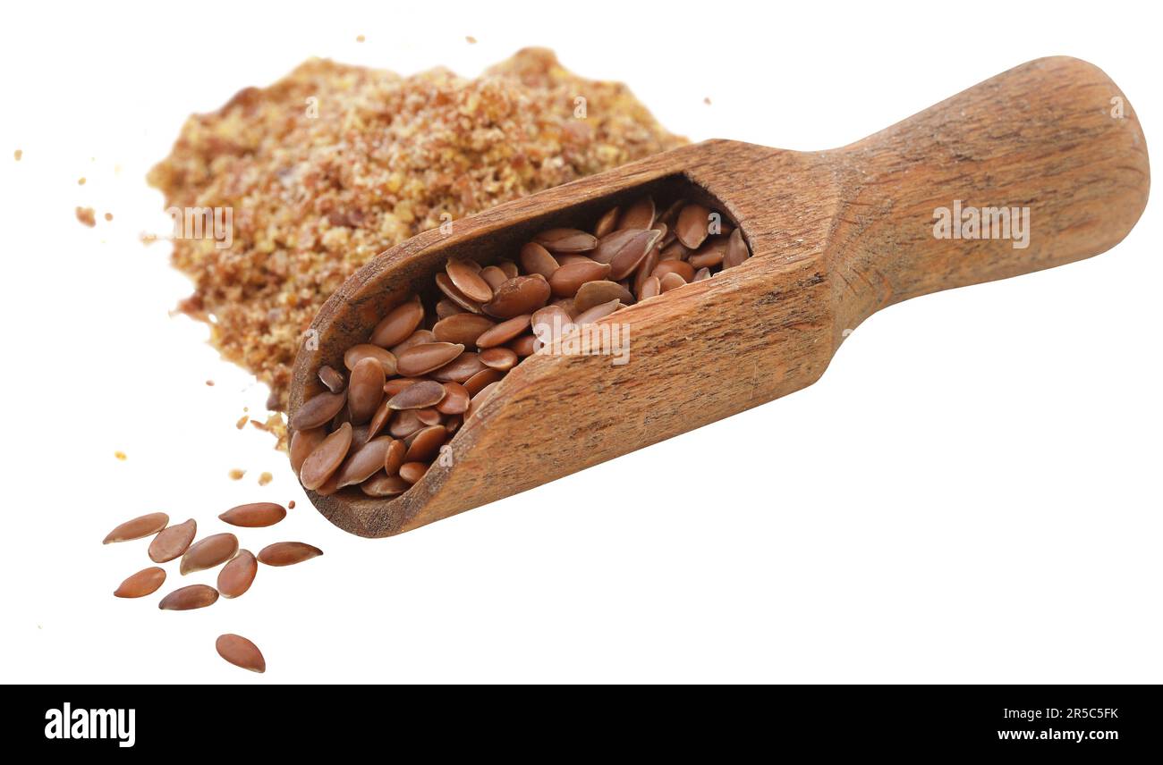 Organic whole and crushed flax seeds closeup Stock Photo - Alamy