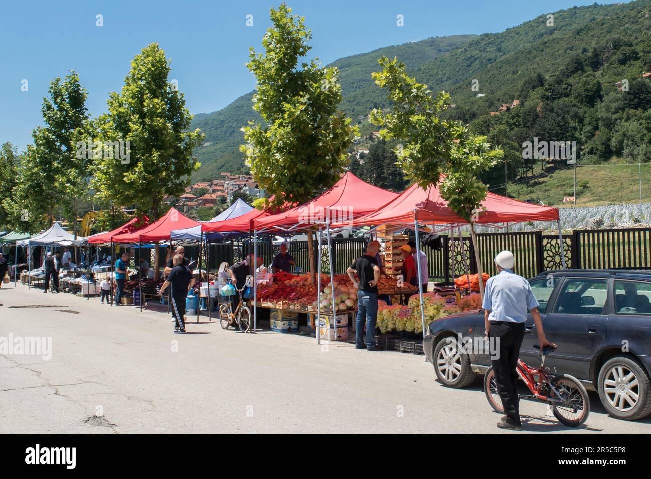 A busy open market in the streets of the city of Tetovo, in North ...