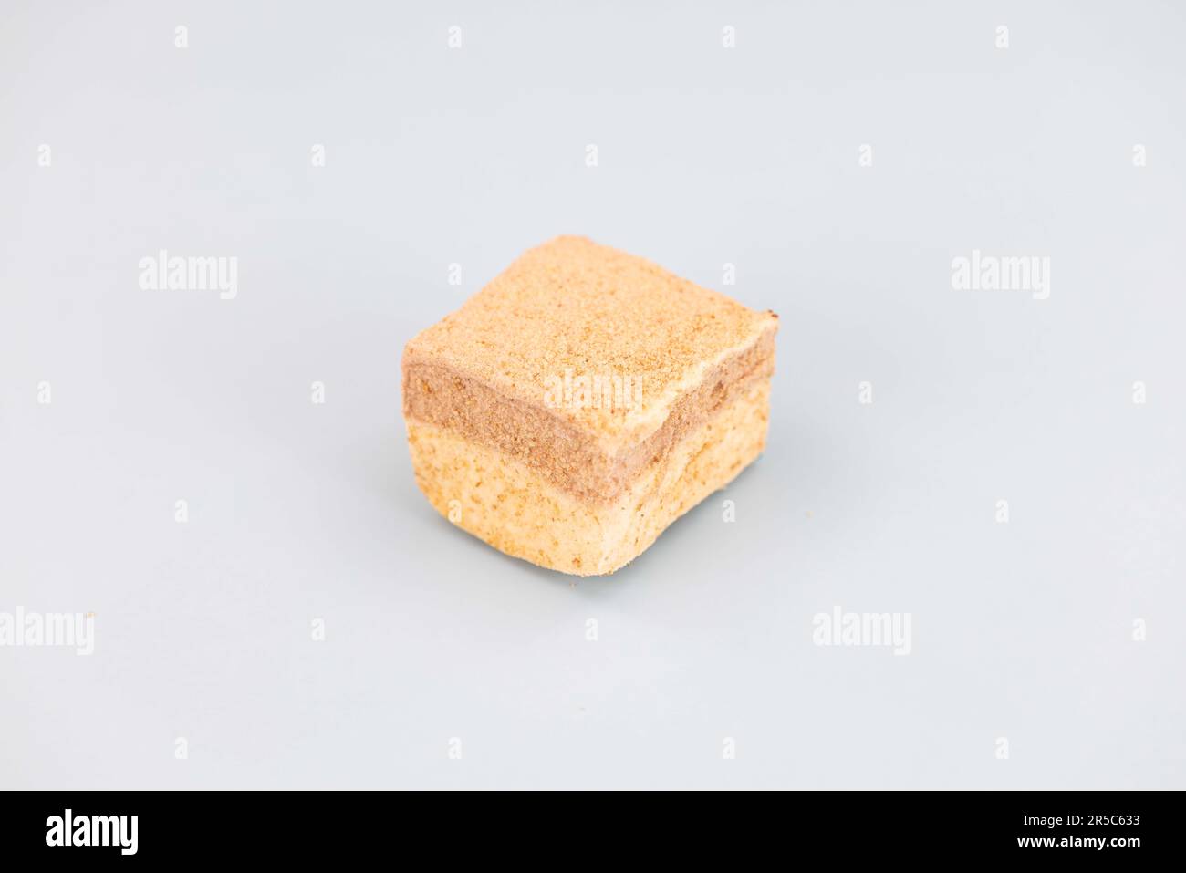 An image of a brown block of sponge placed in a grey ceramic bowl Stock ...