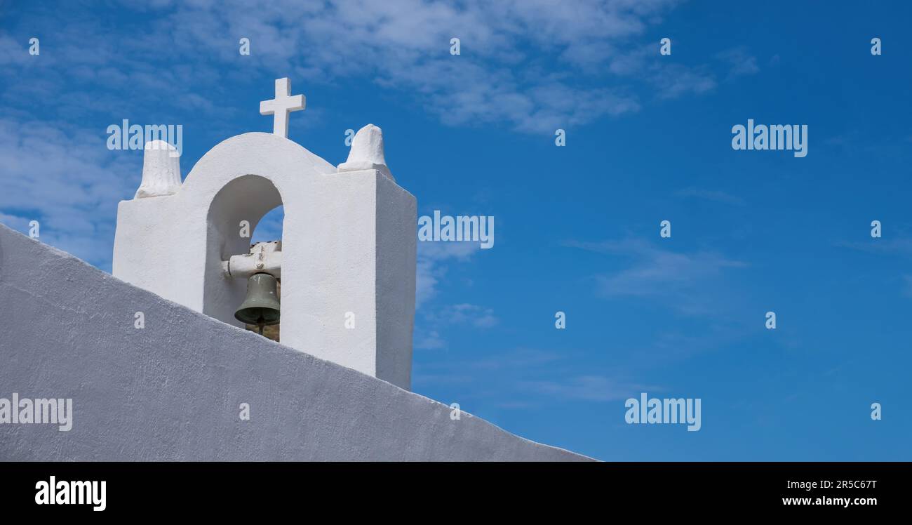 Small orthodox church belfry, white color chapel roof on clear blue sky ...