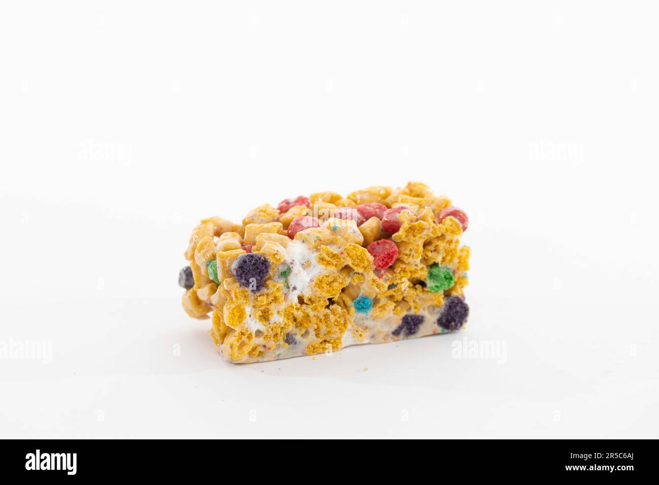 A clean white surface featuring a box of cereal and a selection of ...