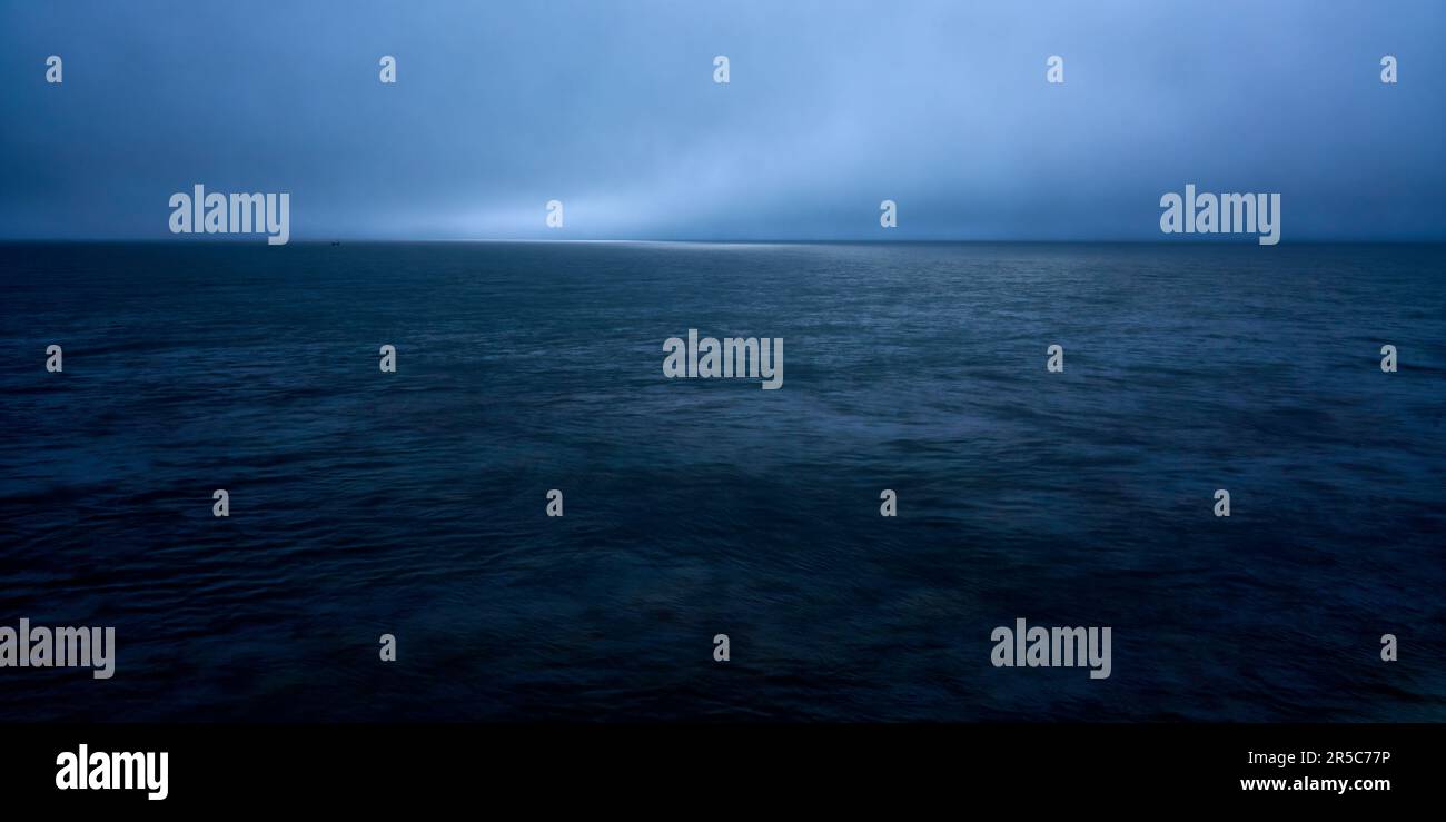 An abstract scene of fog on the sea as a background image Stock Photo ...