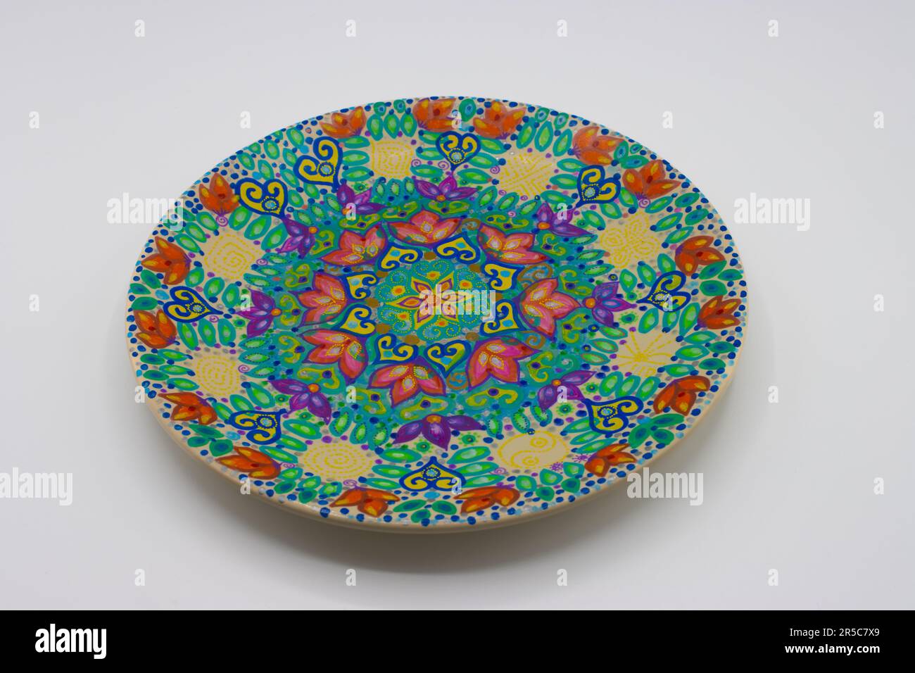 Hand painted plate isolated on white background Stock Photo - Alamy