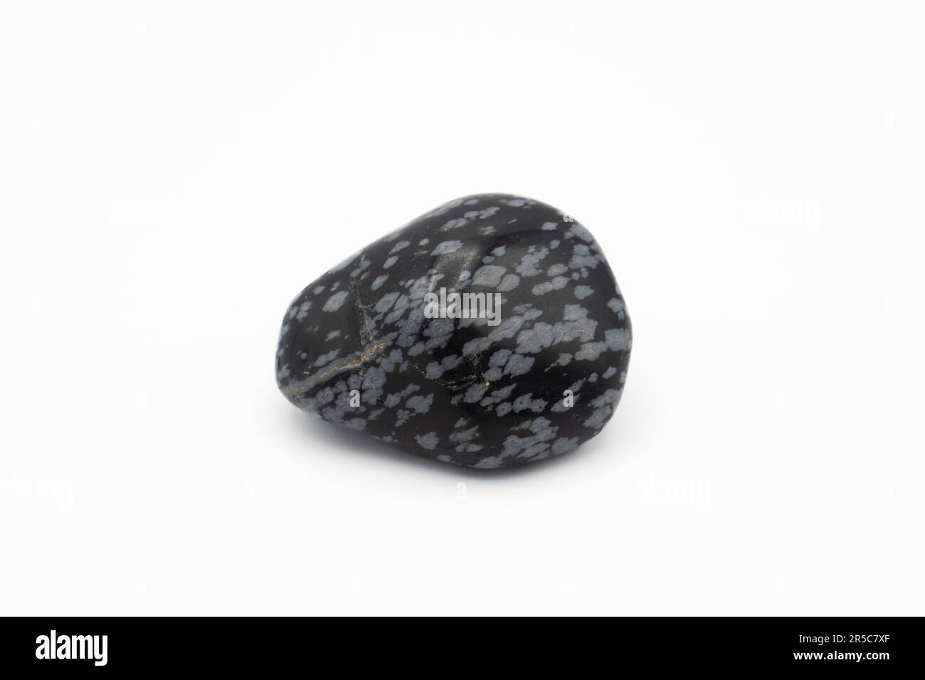 Snowflake Obsidian stone isolated on white background Stock Photo - Alamy