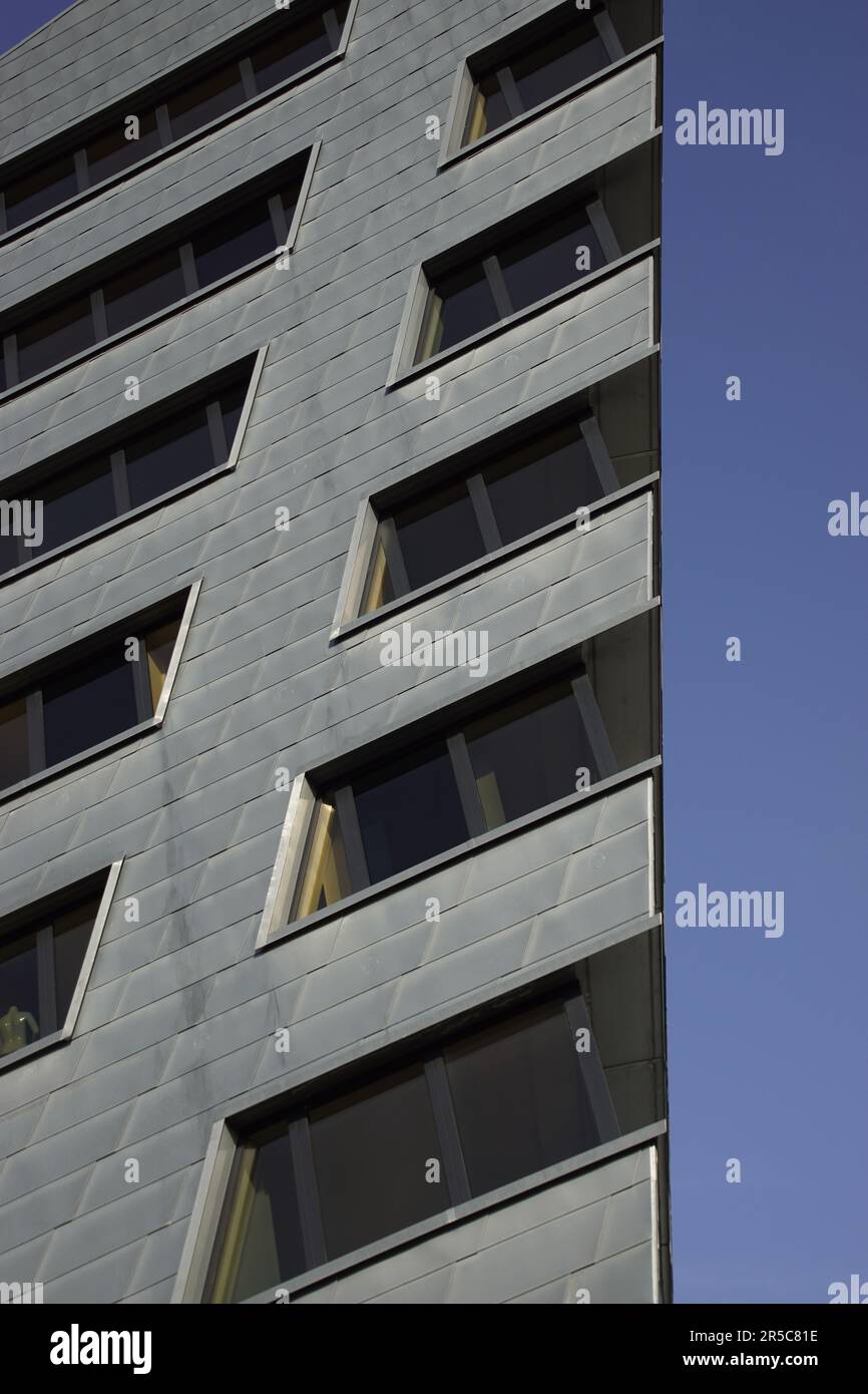 A skyline view of a bustling city, featuring tall buildings with ...