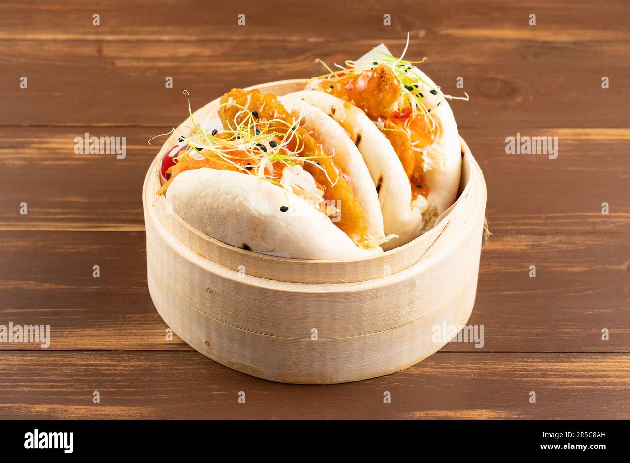Bao buns, steamed buns with chicken and vegetable. Asian cuisine Stock ...