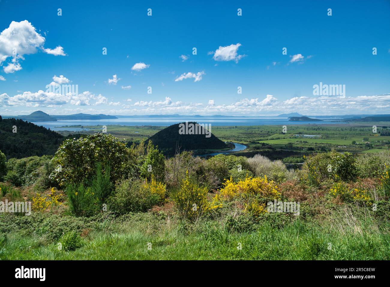 A picturesque view of a stunning valley surrounded by a shimmering ...