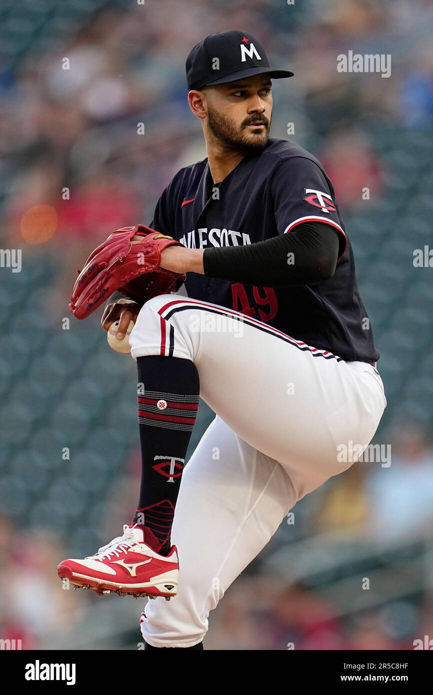 Minnesota Twins starting pitcher Pablo Lopez winds up to deliver during ...