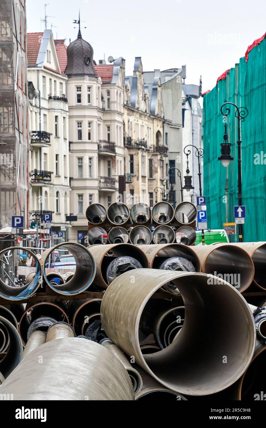 Landfill of steel water pipes during the renovation of a street in the ...