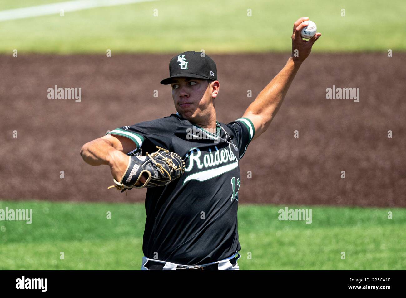 Wright State pitcher Sebastian Gongora (13) delivers a pitch during an ...