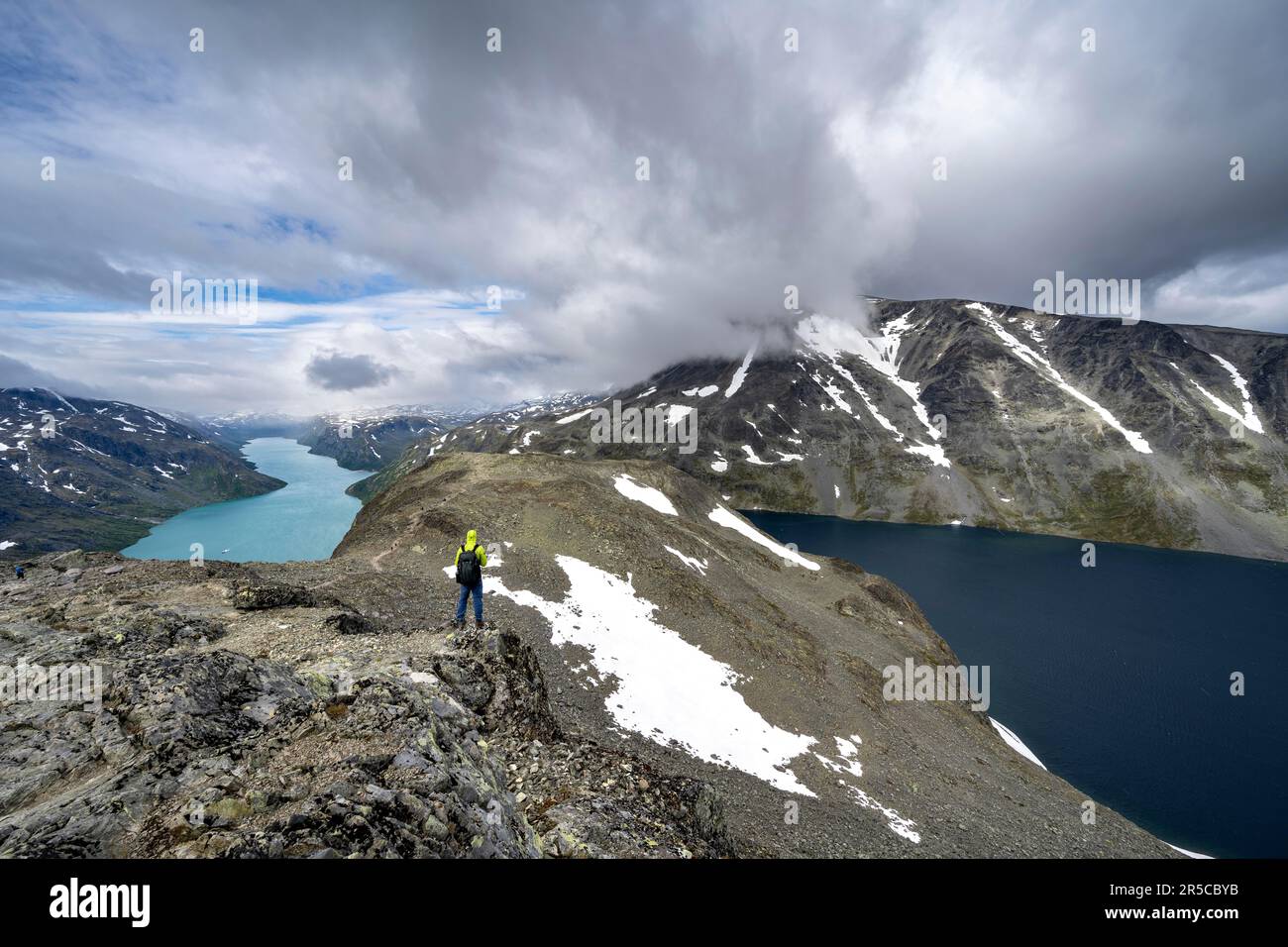 Climbers on stony trail, Besseggen hike, ridge walk, view of Lake ...