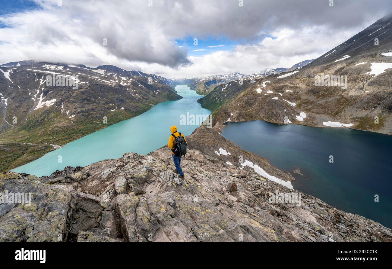 Mountaineers on Besseggen hike, ridge walk, view of Lake Gjende, Lake ...