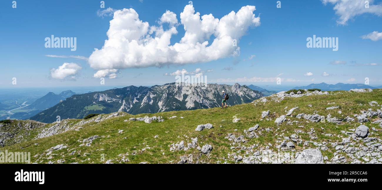 Mountaineer on the ridge, behind mountain range Zah, crossing the ...