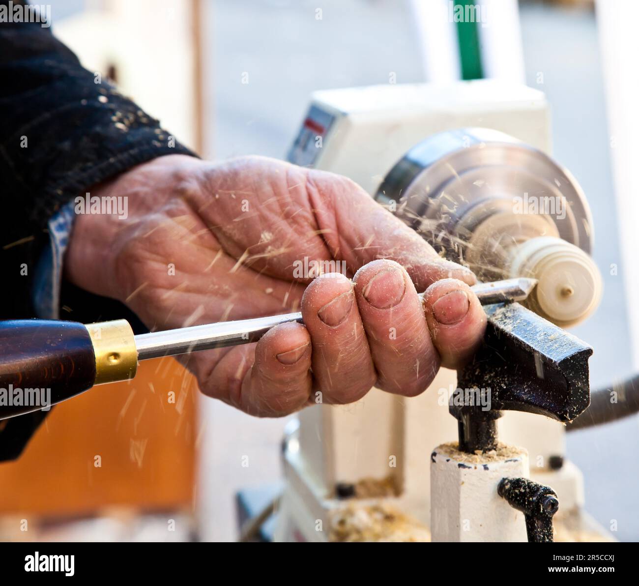 Old worker hands at lathe Stock Photo - Alamy
