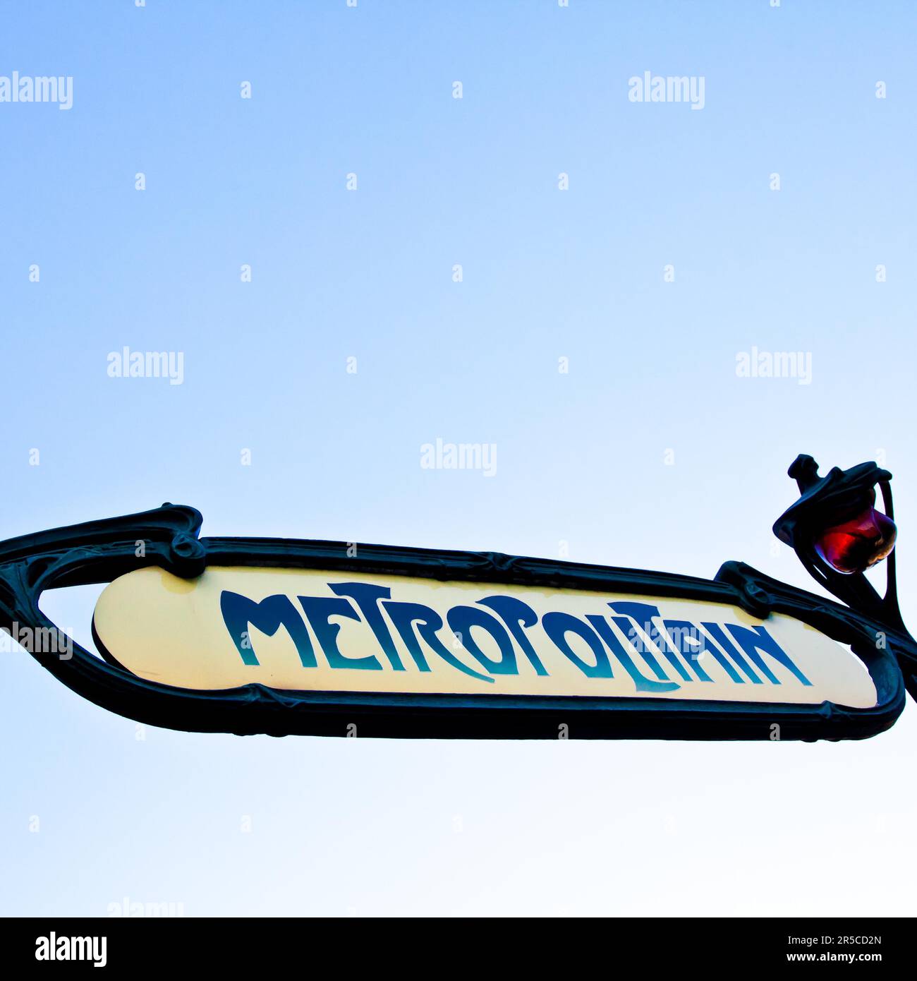 Traditional entrance sign of metro station in Paris. Clean sky in ...