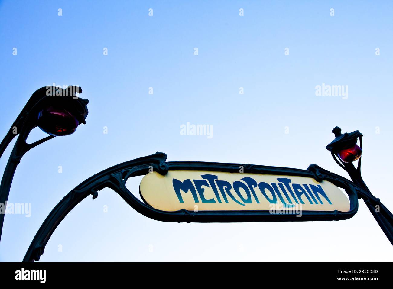 Traditional entrance sign of metro station in Paris. Clean sky in ...
