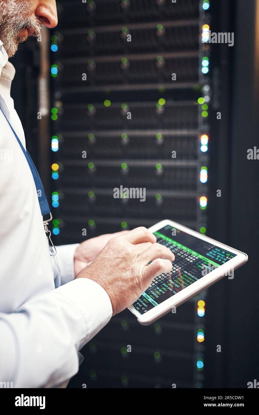 Making technical tasks super simple. a mature man using a digital ...